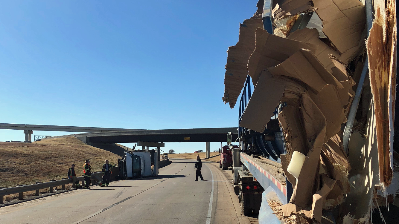 Mechanic avoids injuries after box top truck smashes into semi-truck ...